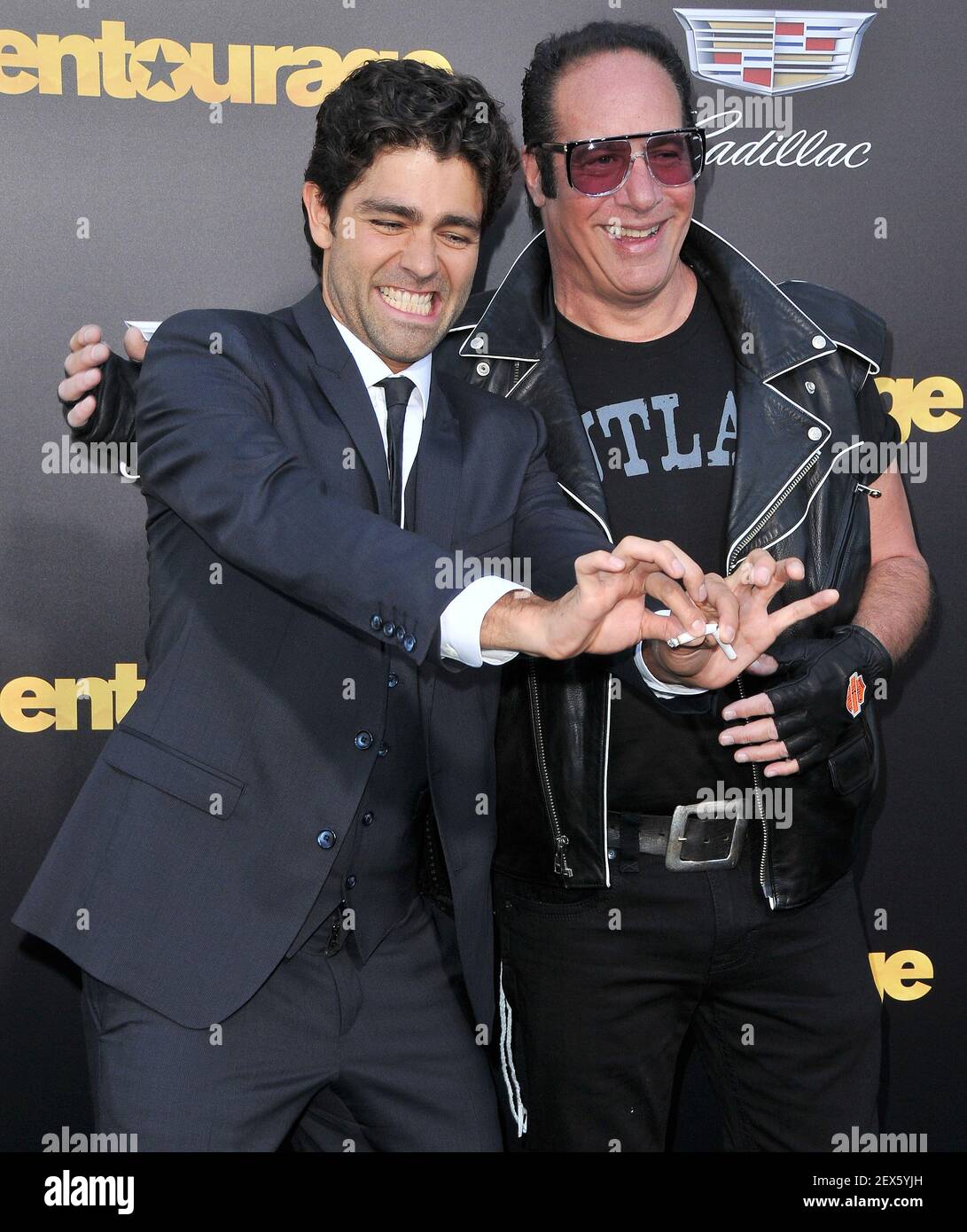 (L-R) Adrian Grenier and breaks Andrew Dice Clay's cigarette on the ...