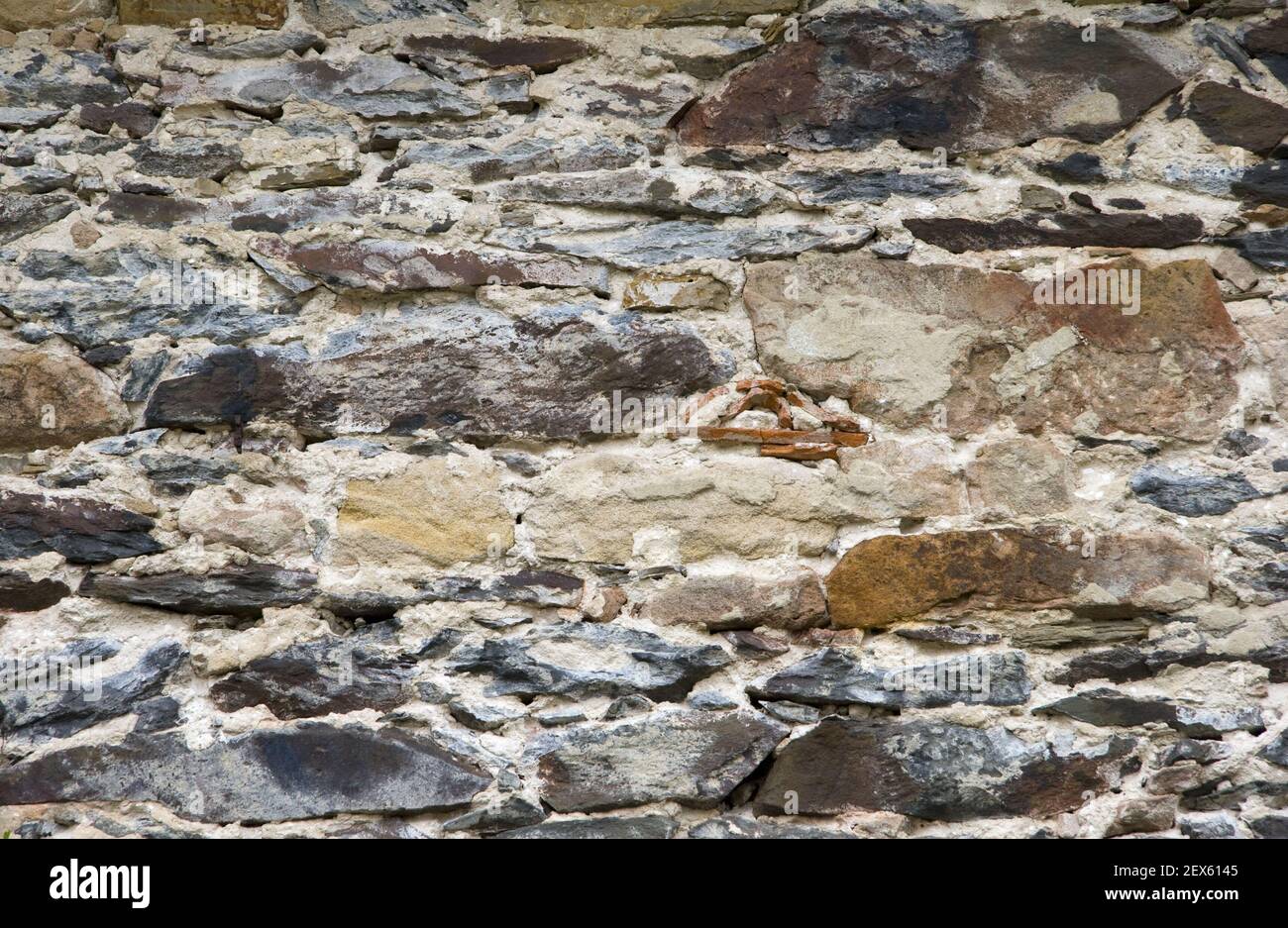 Quarry stone wall Stock Photo - Alamy