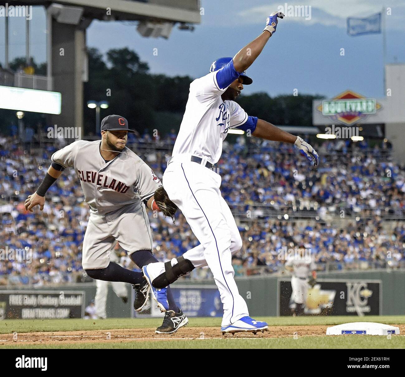 Cleveland Indians first baseman Carlos Santana, left, tags out the ...