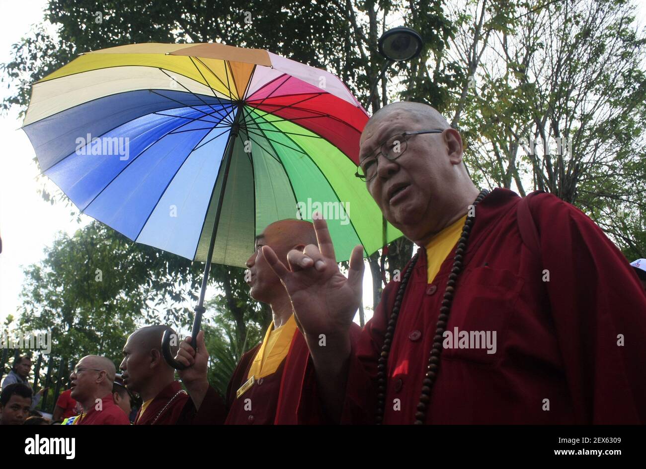 Buddhist monk join the procession from Mendut temple to Borobudur ...