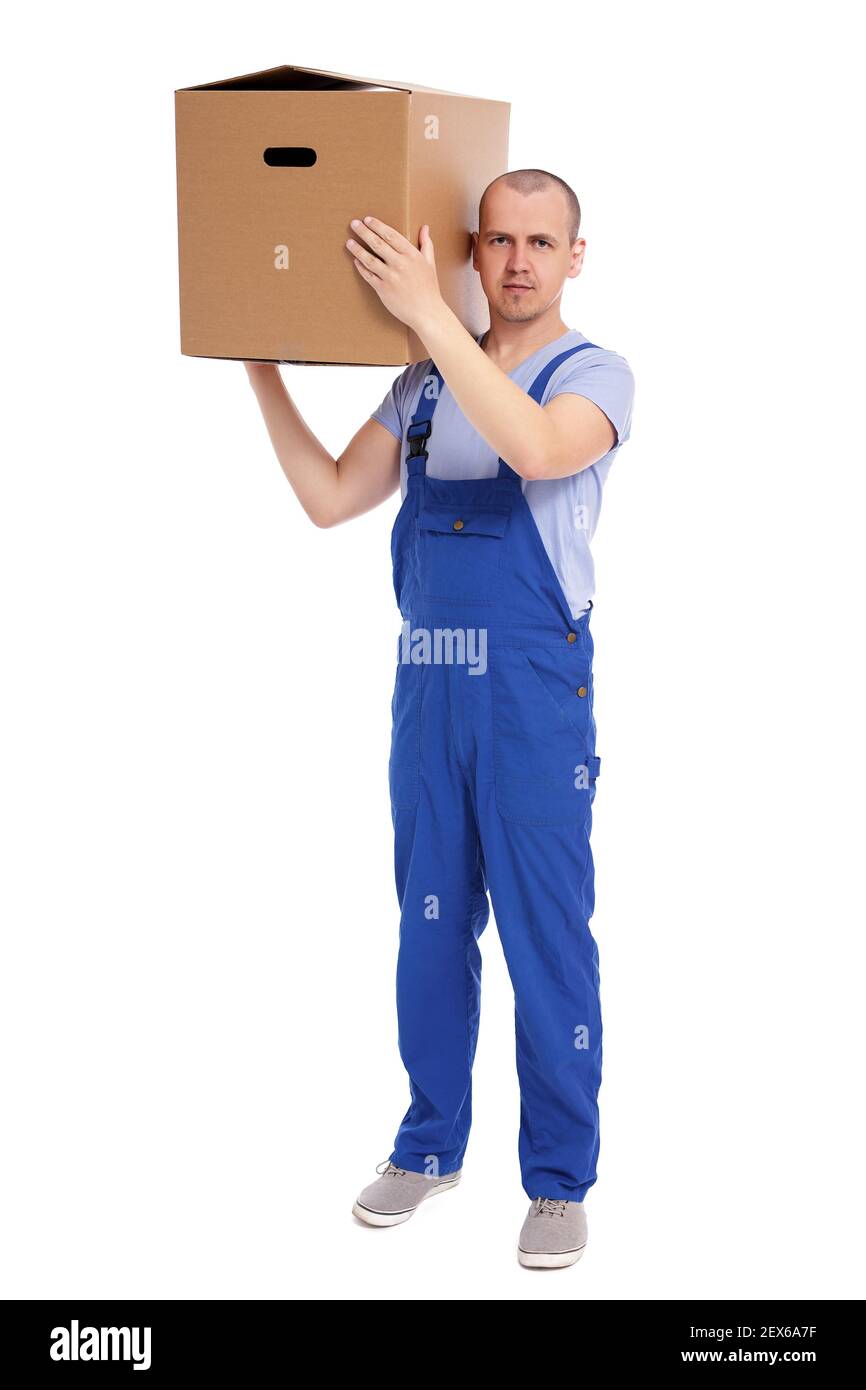 full length portrait of handsome man loader in uniform with big box on ...