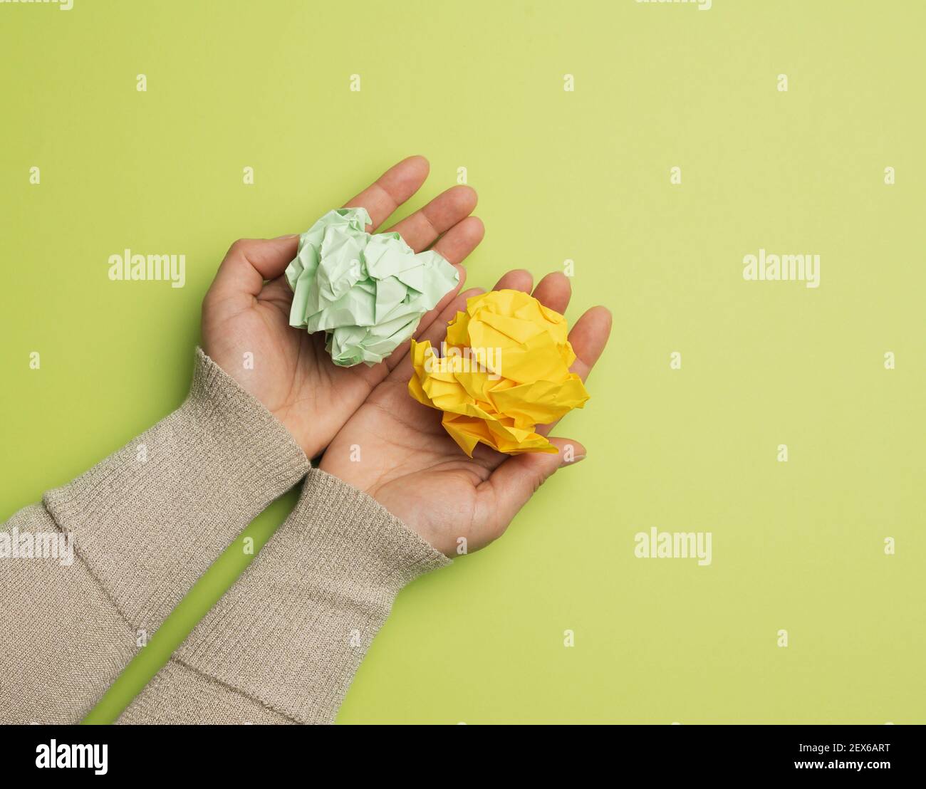 Female hands crumpled sheet hi-res stock photography and images - Alamy