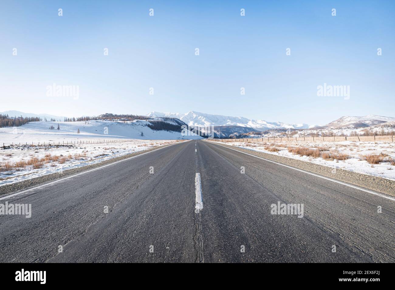 Snow on Highway in a landscape image Stock Photo - Alamy