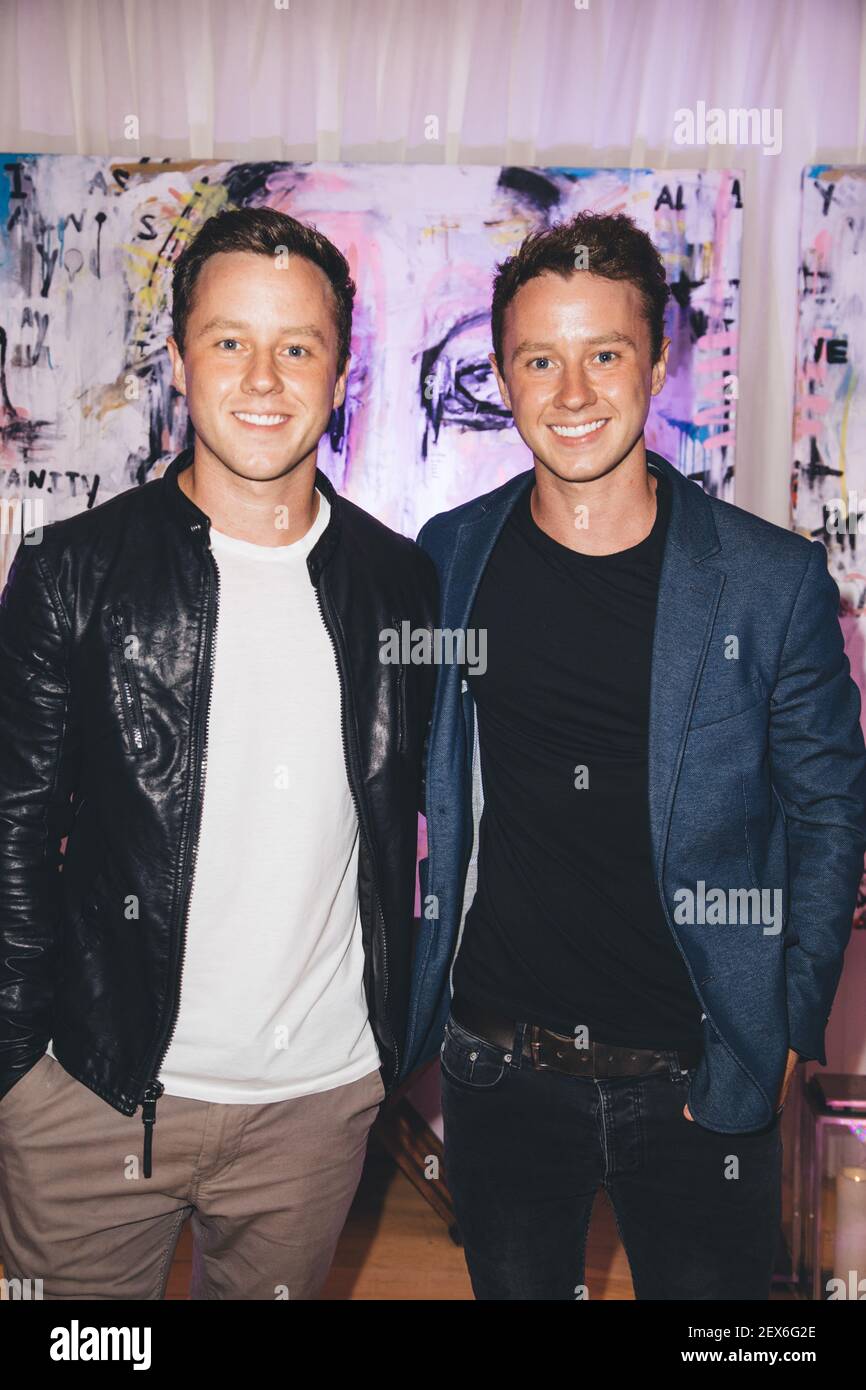 Matt and Jeff Postlethwaite pose at Louis Carreon unveils new art ...