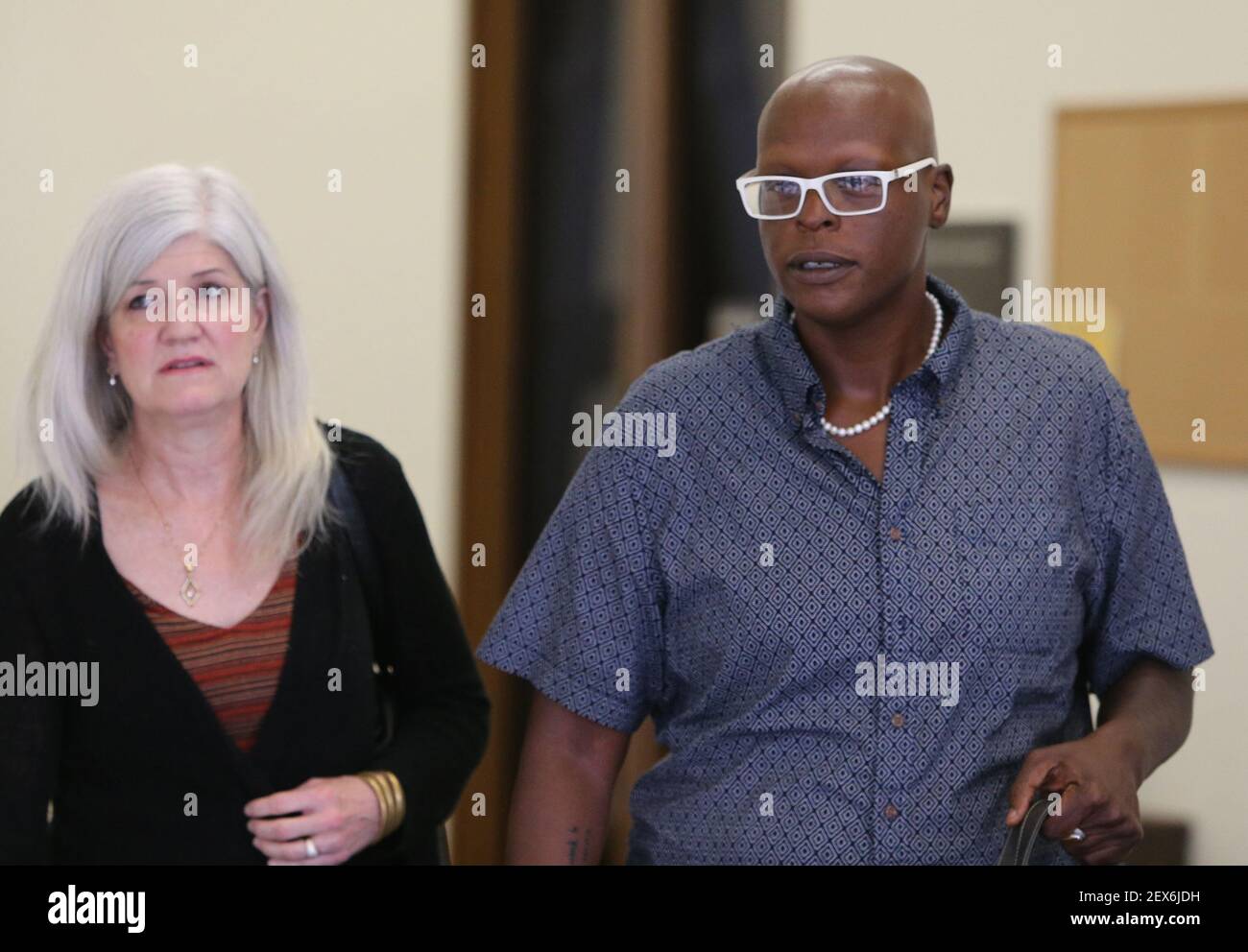Kia Walker, right, mother of Tommy Schaefer, and an unidentified women ...