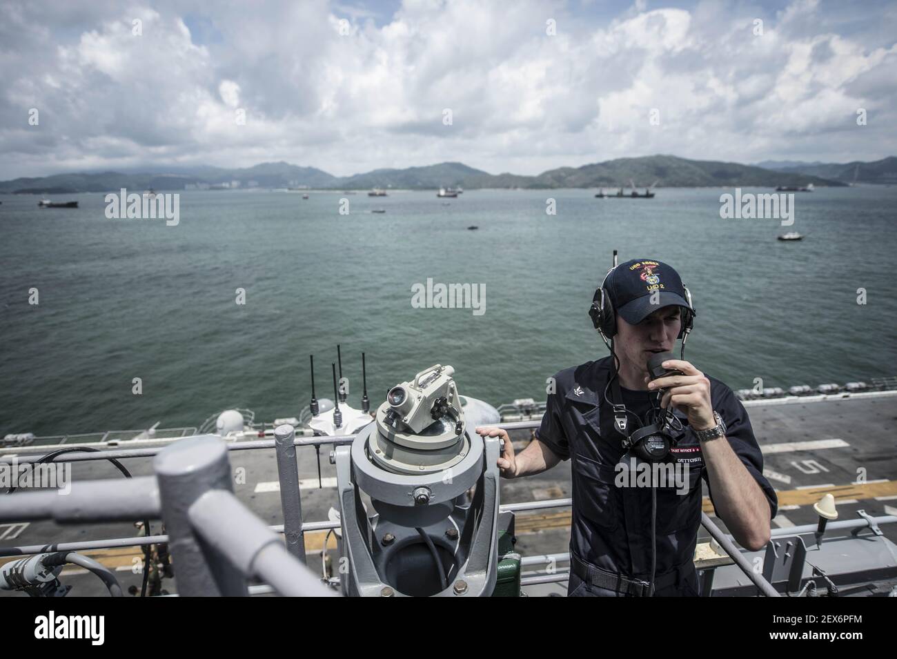 HONG KONG (June 10, 2015) Quartermaster 3rd Class Robert Boettcher uses ...