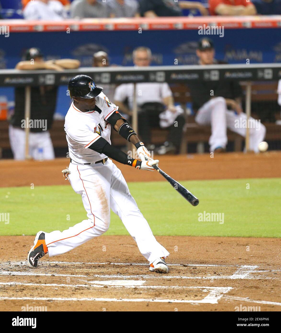 The Miami Marlins' Adeiny Hechavarria hits a two-run triple in the ...