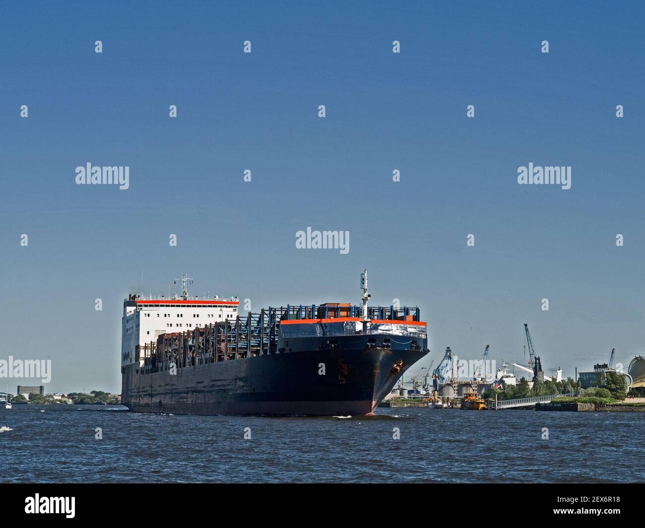 A nearly empty Containership leaving the port Stock Photo - Alamy