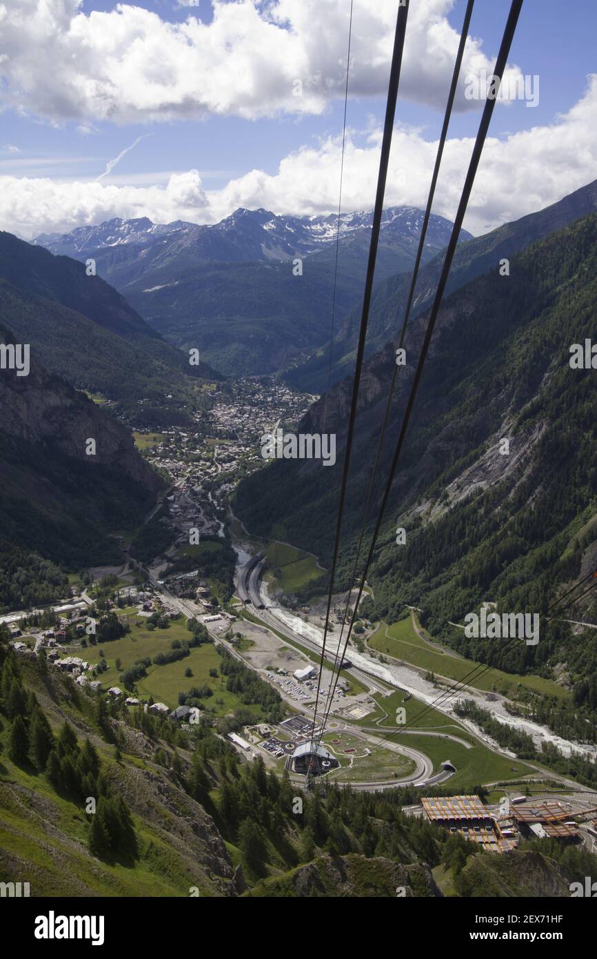View from the Mont Blanc cable car towards Courmayeur and Aosta Valley ...