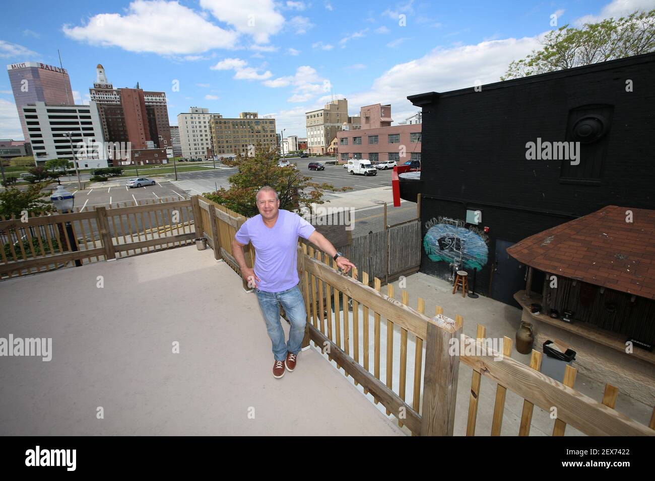 Owner Coby Frier shows off the outdoor space of the Hideaway Club ...