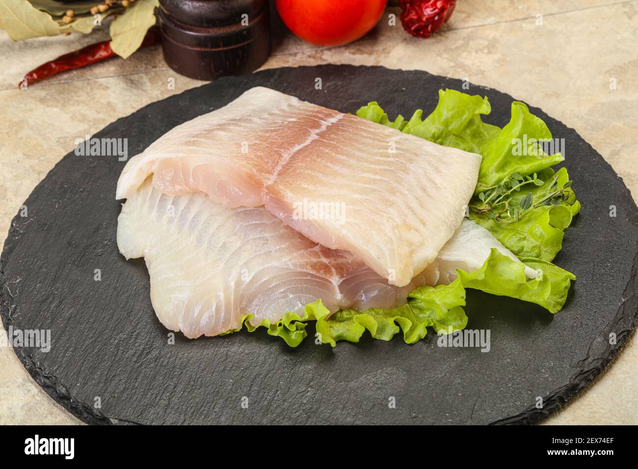 Raw pangasius fillet fish for cooking Stock Photo - Alamy