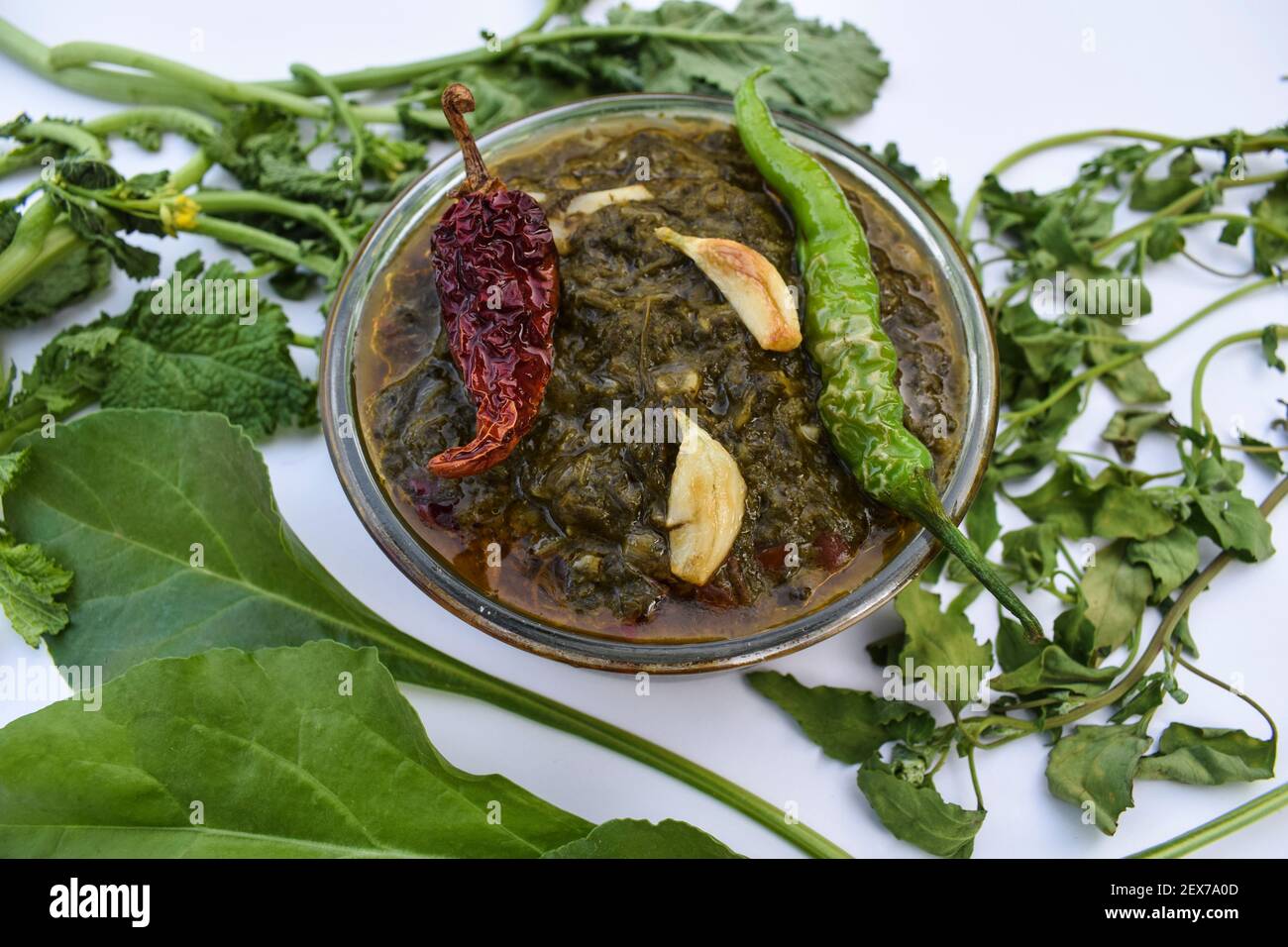 Indian homemade curry Sarson ka saag ki sabji served in transparent ...