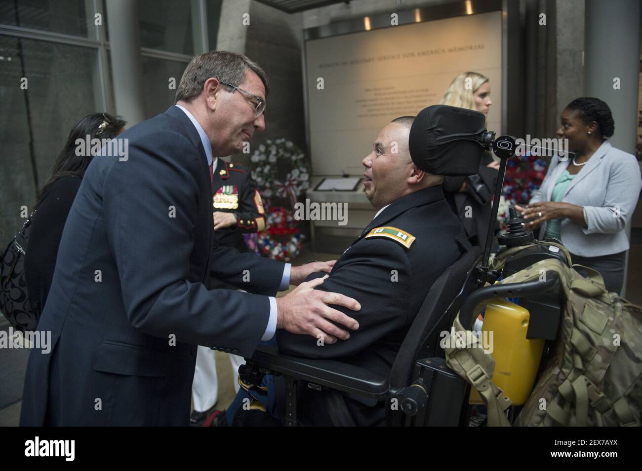 Secretary of Defense Ash Carter speaks with Capt. Luis Avila as he ...