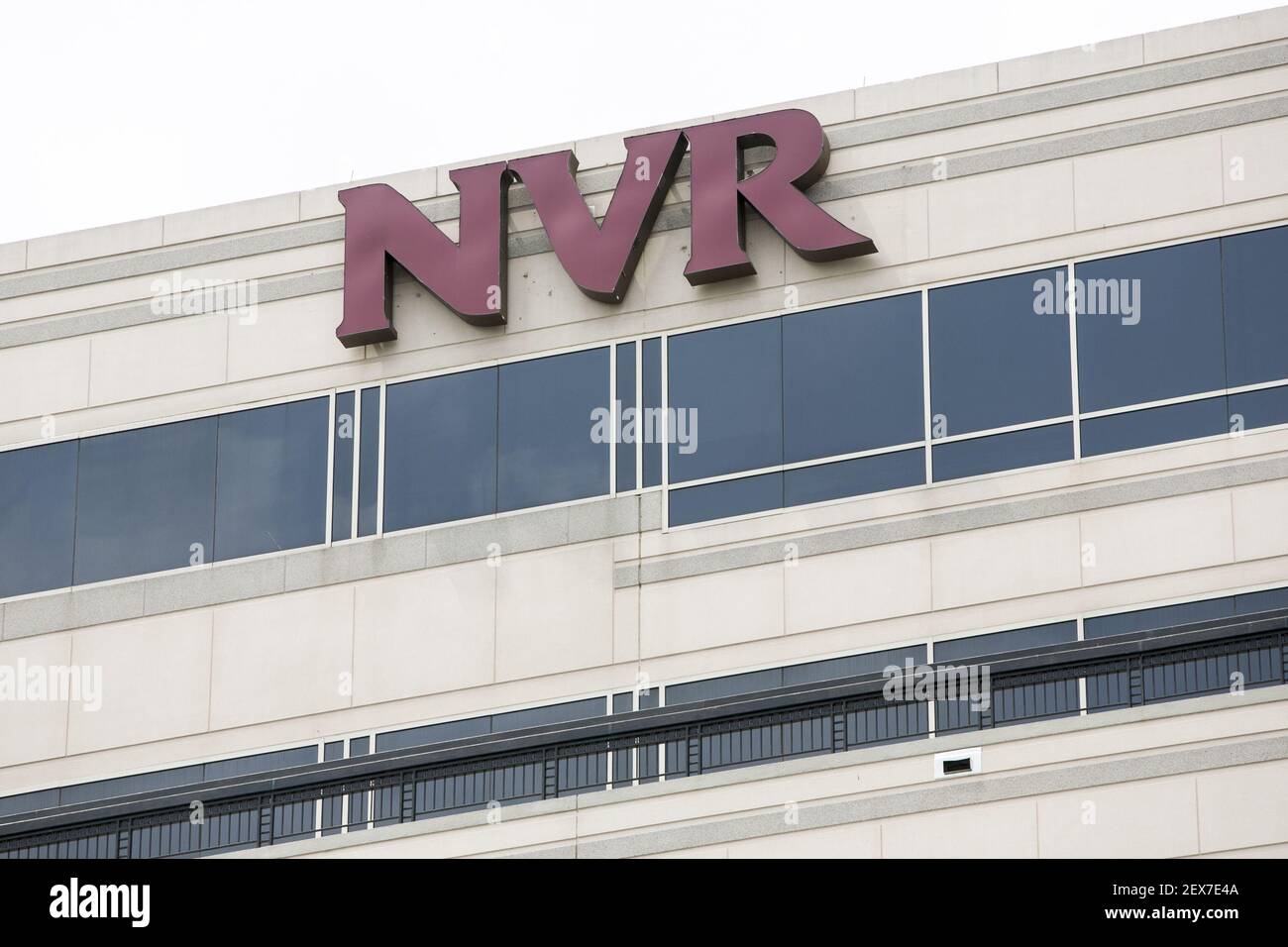 A logo sign outside of the headquarters of NVR, Inc., the parent ...