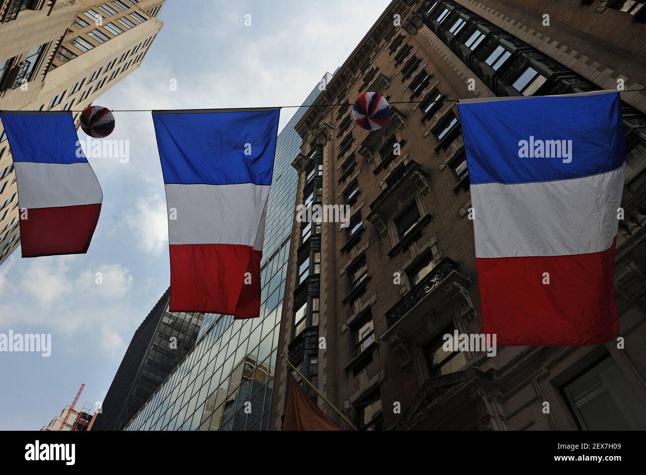 French flags fly above 60th Street during Bastille Day Celebration in ...