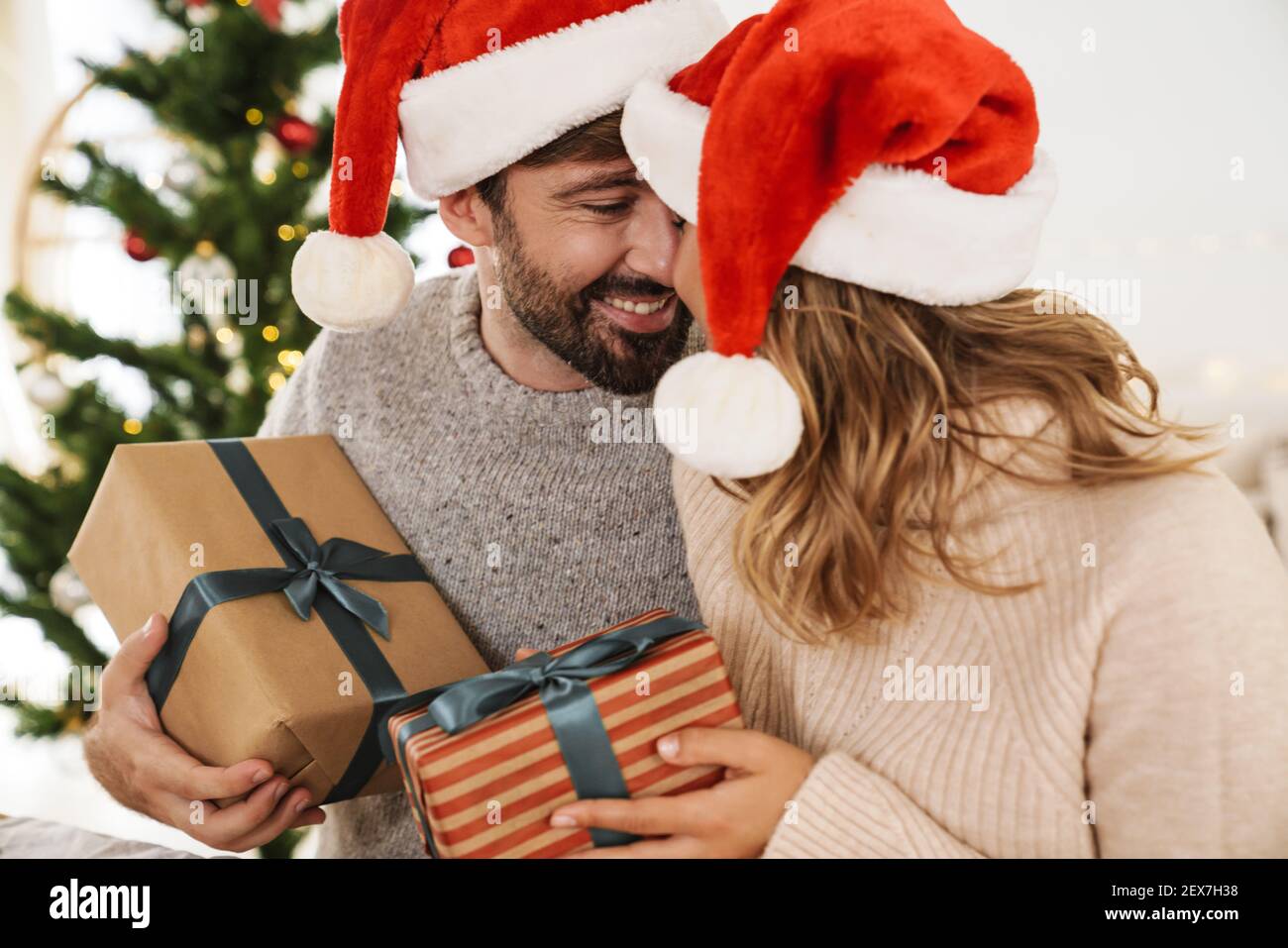 People Giving Gifts To Each Other