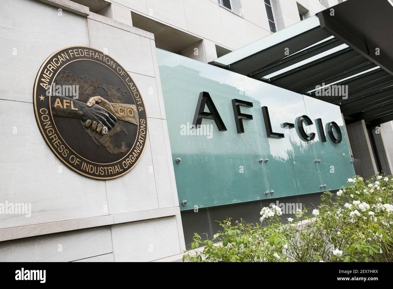 A logo sign outside of the headquarters of the American Federation of ...