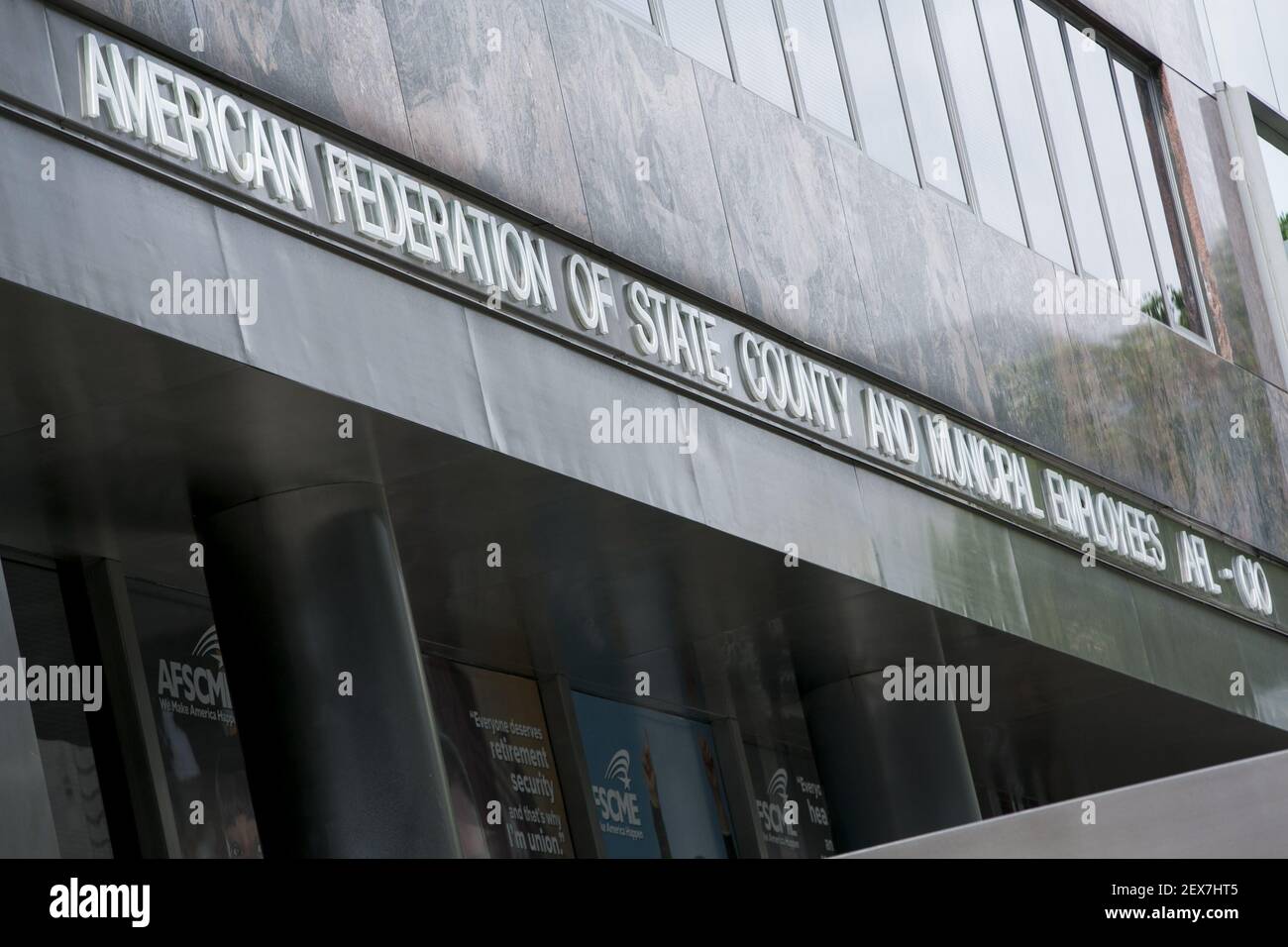 A logo sign outside of the headquarters of the American Federation of ...