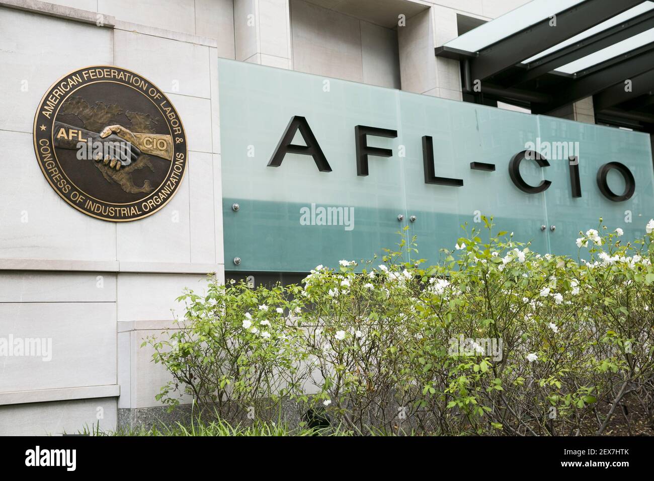 A logo sign outside of the headquarters of the American Federation of ...