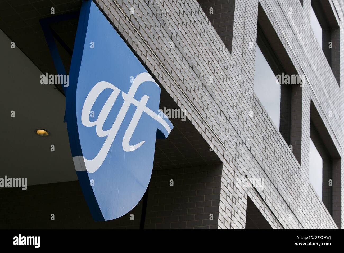 A logo sign outside of the headquarters of the American Federation of ...