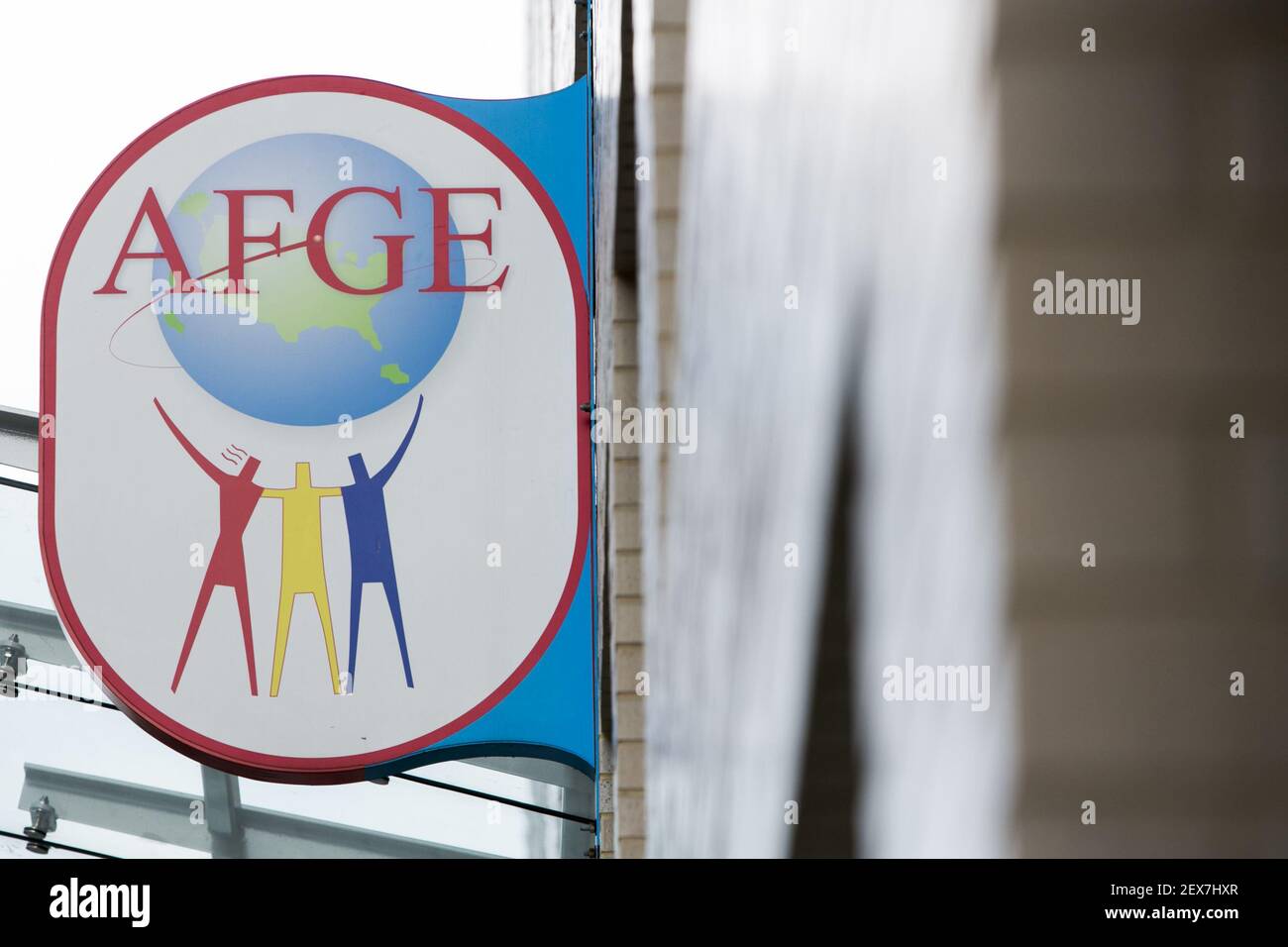 A logo sign outside of the headquarters of the American Federation of ...