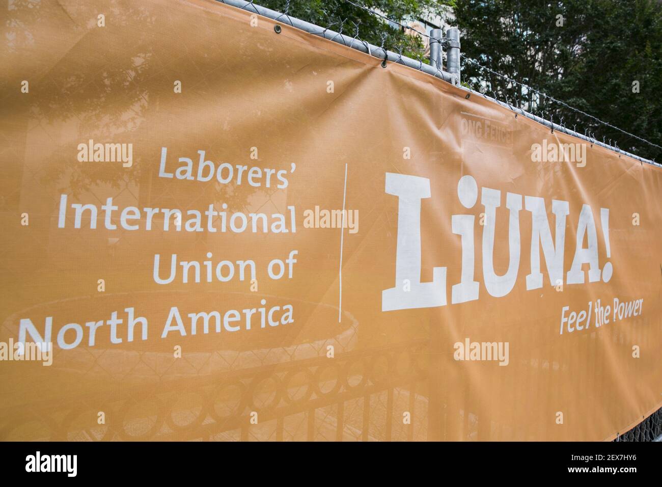 A logo sign outside of the headquarters of the Laborers' International ...