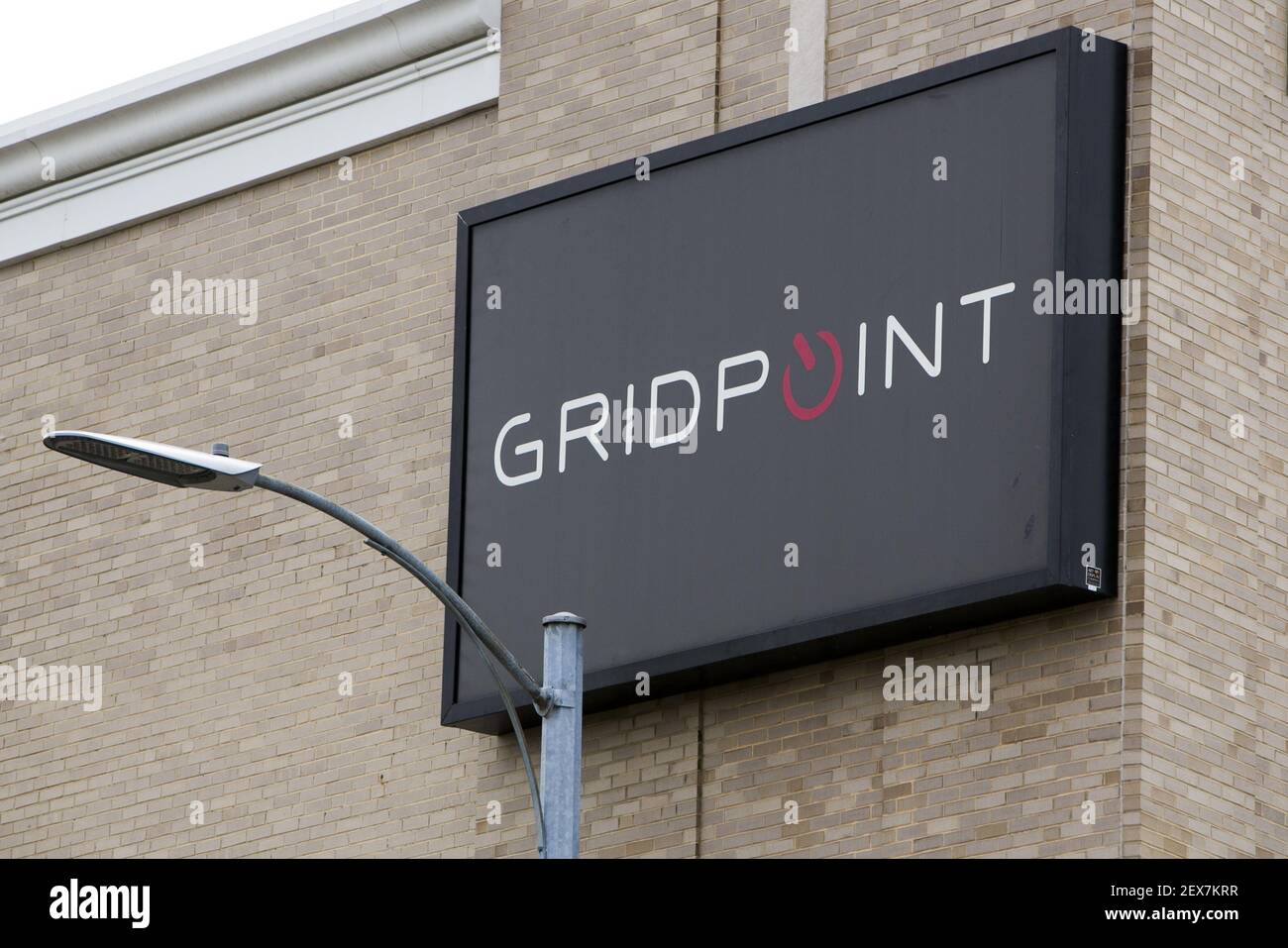 A logo sign outside of the headquarters of GridPoint in Arlington ...