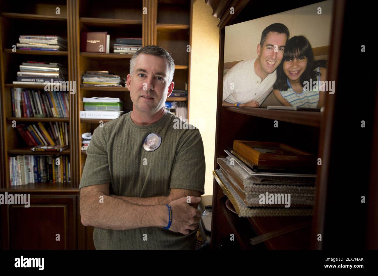 Steve Roberts is seen at his home in Euless, Texas, with pictures of ...