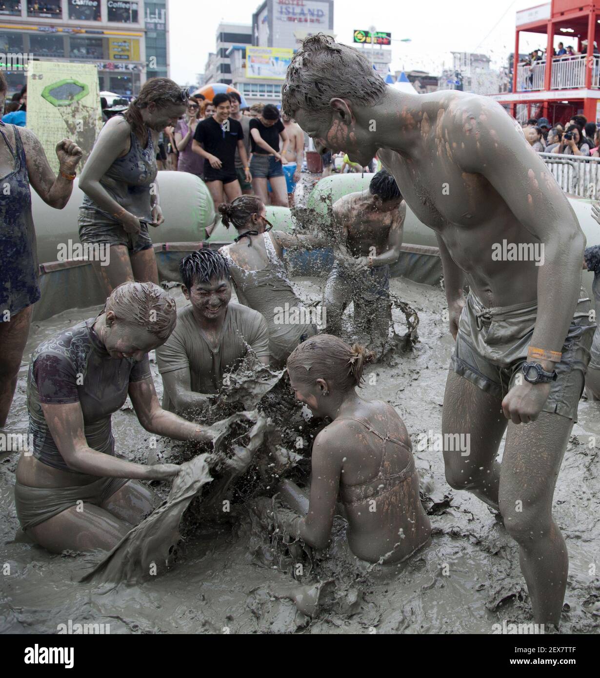 18 July 2015 - Bryeong, South Korea : Peoples player mud pool during the annual 18th Boryeong ...