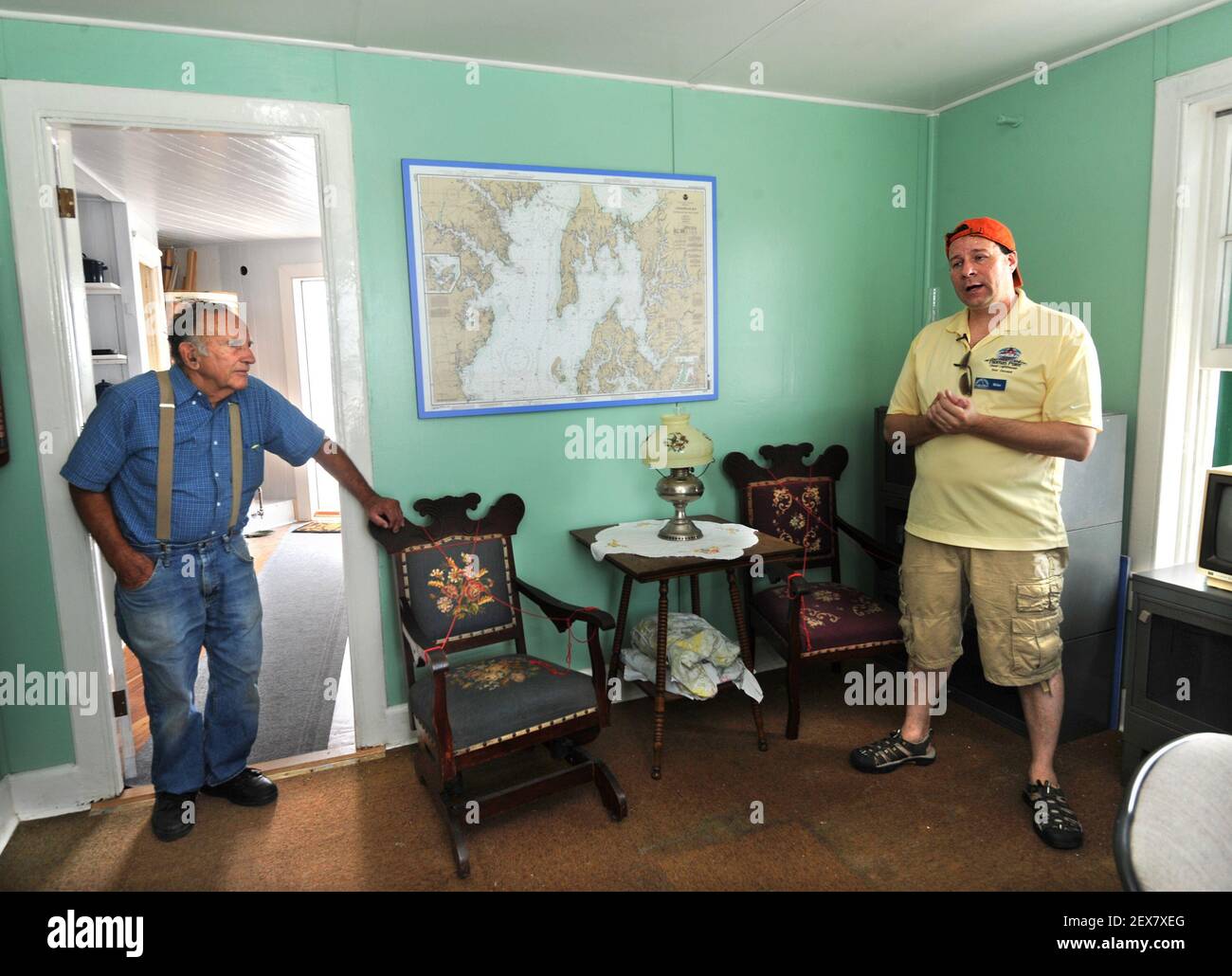 Ed Chidakel, left, listens to docent Mike Thorpe talk about the Coast ...