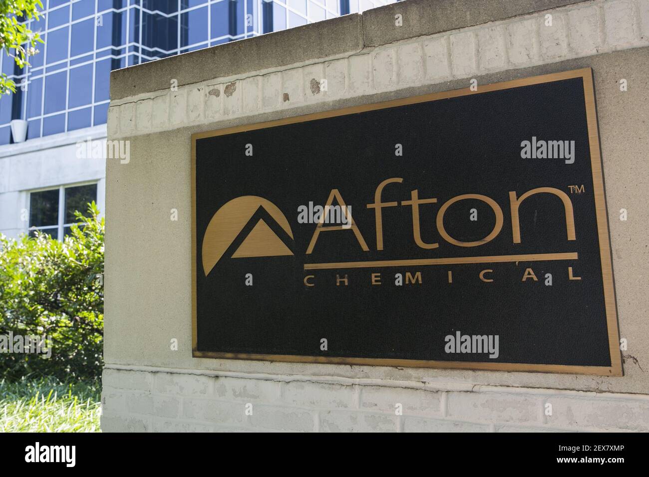 A logo sign outside of the headquarters of the Afton Chemical ...