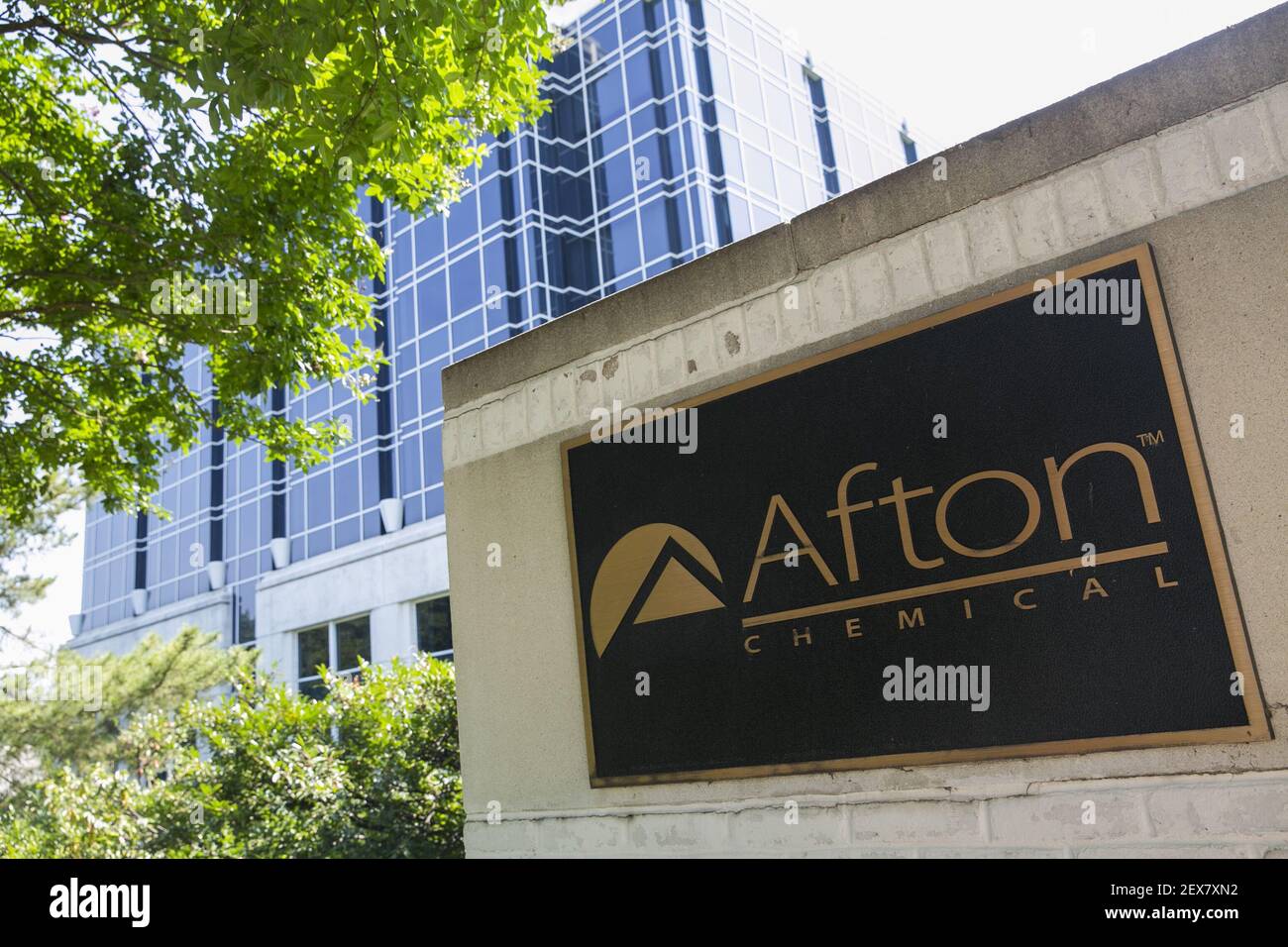 A logo sign outside of the headquarters of the Afton Chemical ...