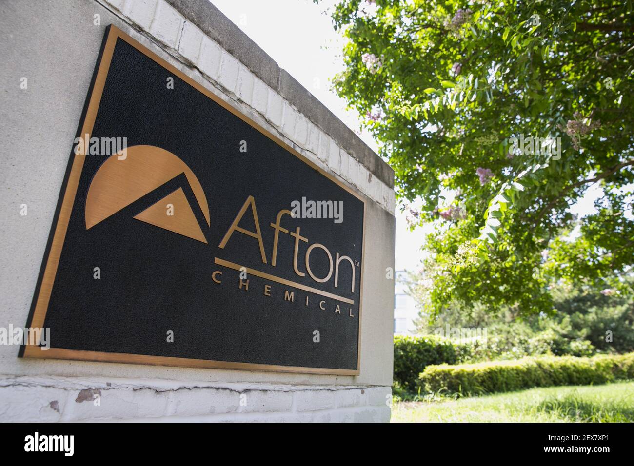 A logo sign outside of the headquarters of the Afton Chemical ...