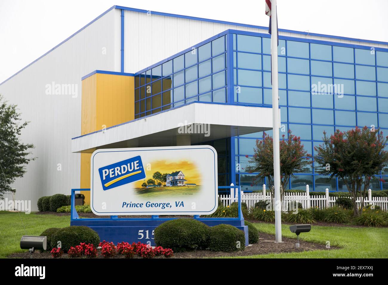 A logo sign outside of a chicken processing facility occupied by Perdue ...