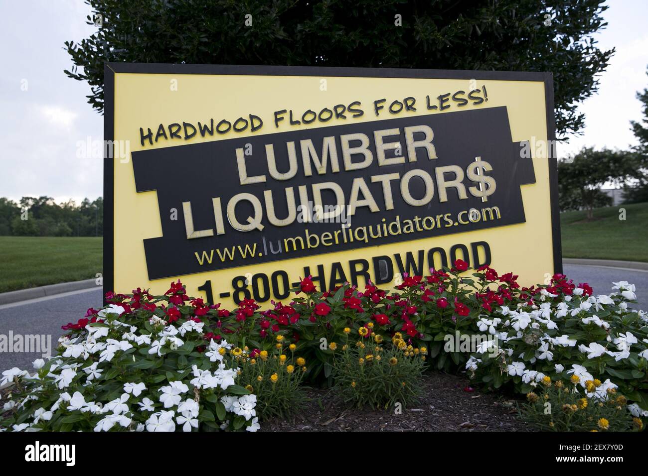 A logo sign outside of the headquarters of Lumber Liquidators, Inc., in ...