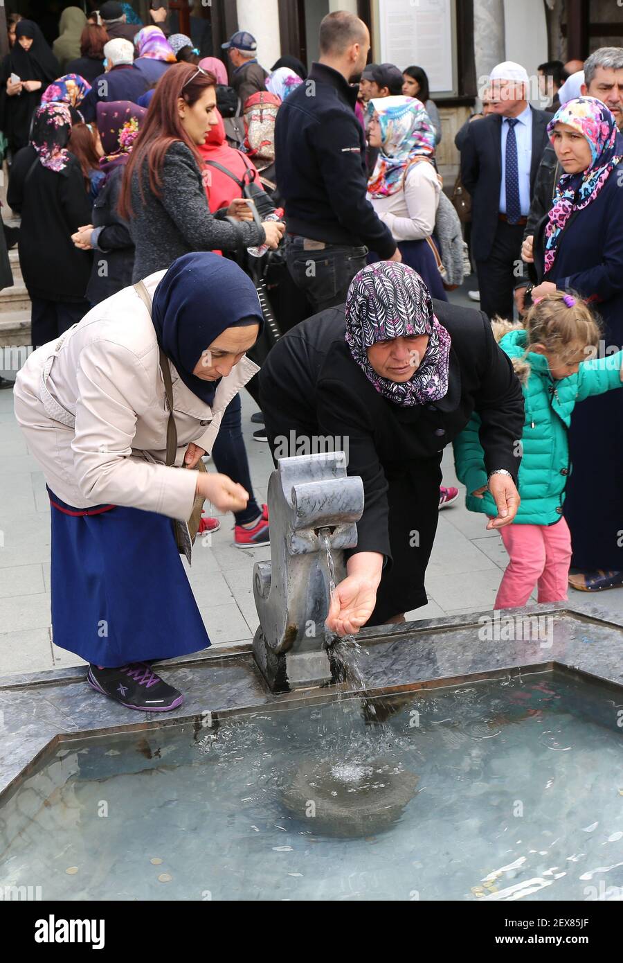 KONYA,TURKEY-APRIL 23:Unidentified Muslim Women washing their hands at ...