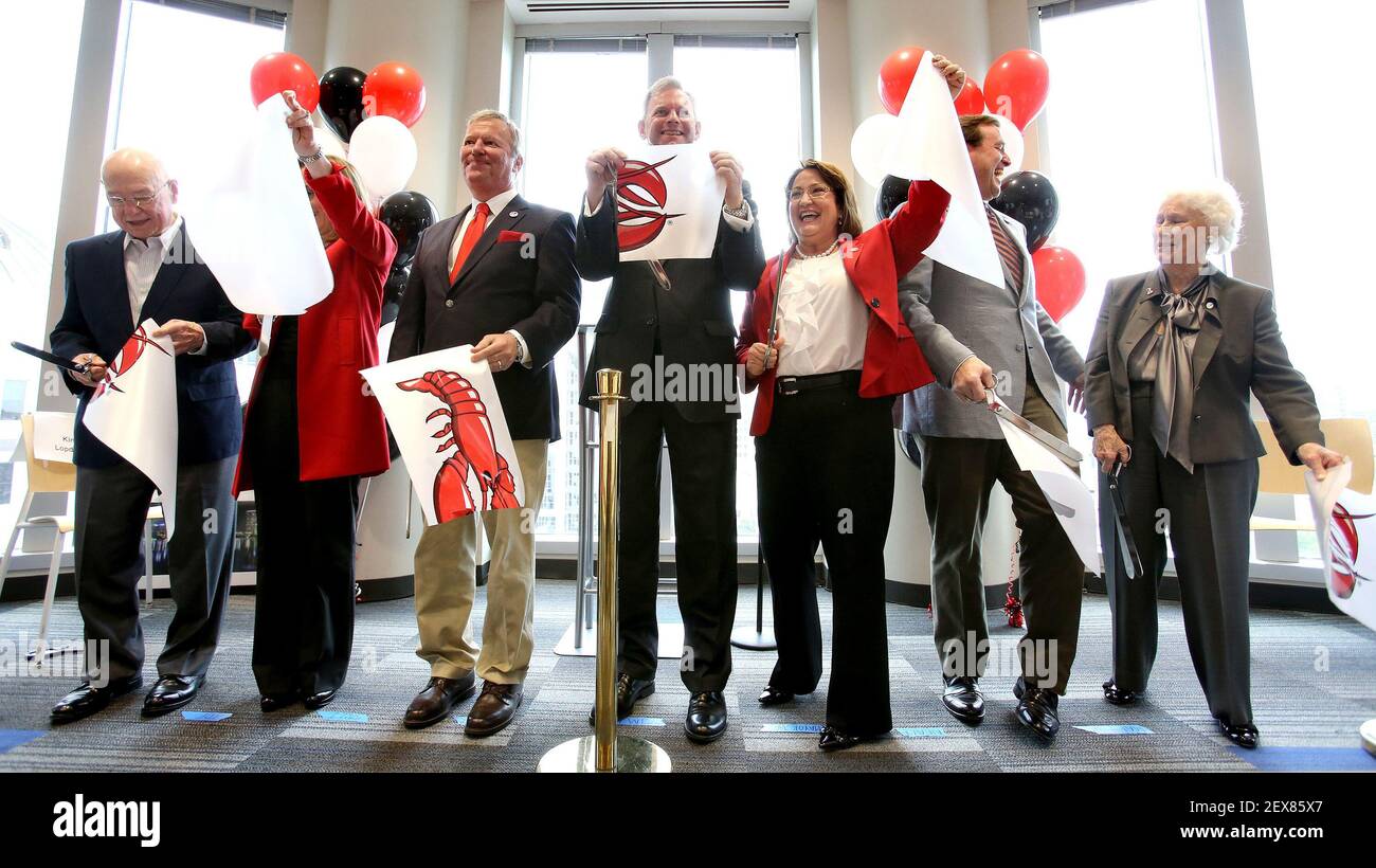Executives and elected officials cut the ribbon during the dedication ...