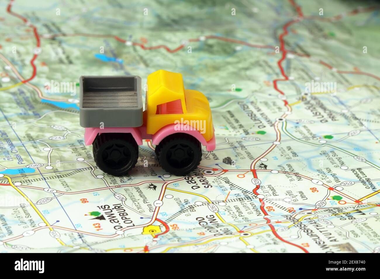 Car on map Stock Photo - Alamy