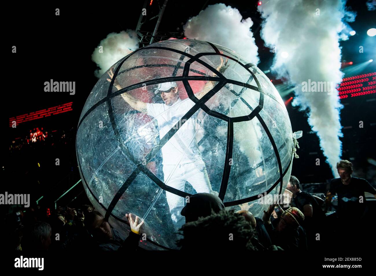 Diplo of Major Lazer in a zorb over the mainstage crowd on day 2 of ...