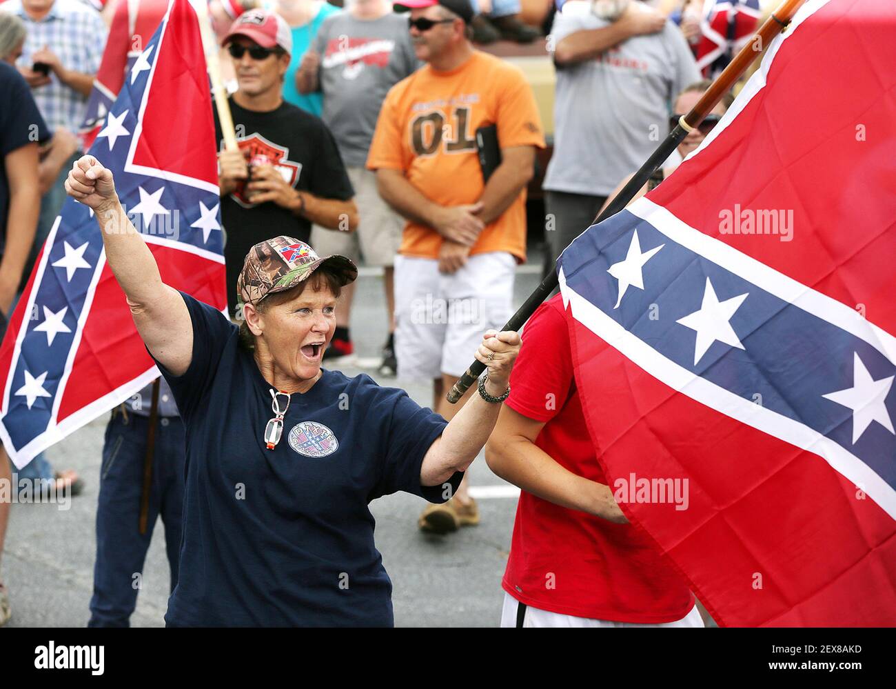 Betty Bishop, Temple, Ga., waves her flag during a pro-Confederate flag ...