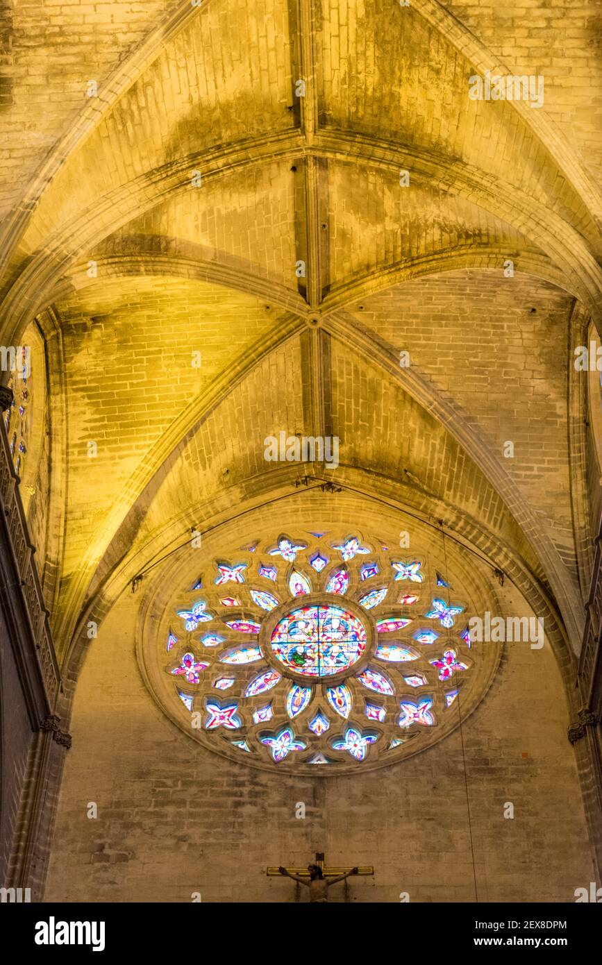 Ornate windows and celings in the Seville Cathedral Spain Stock Photo ...