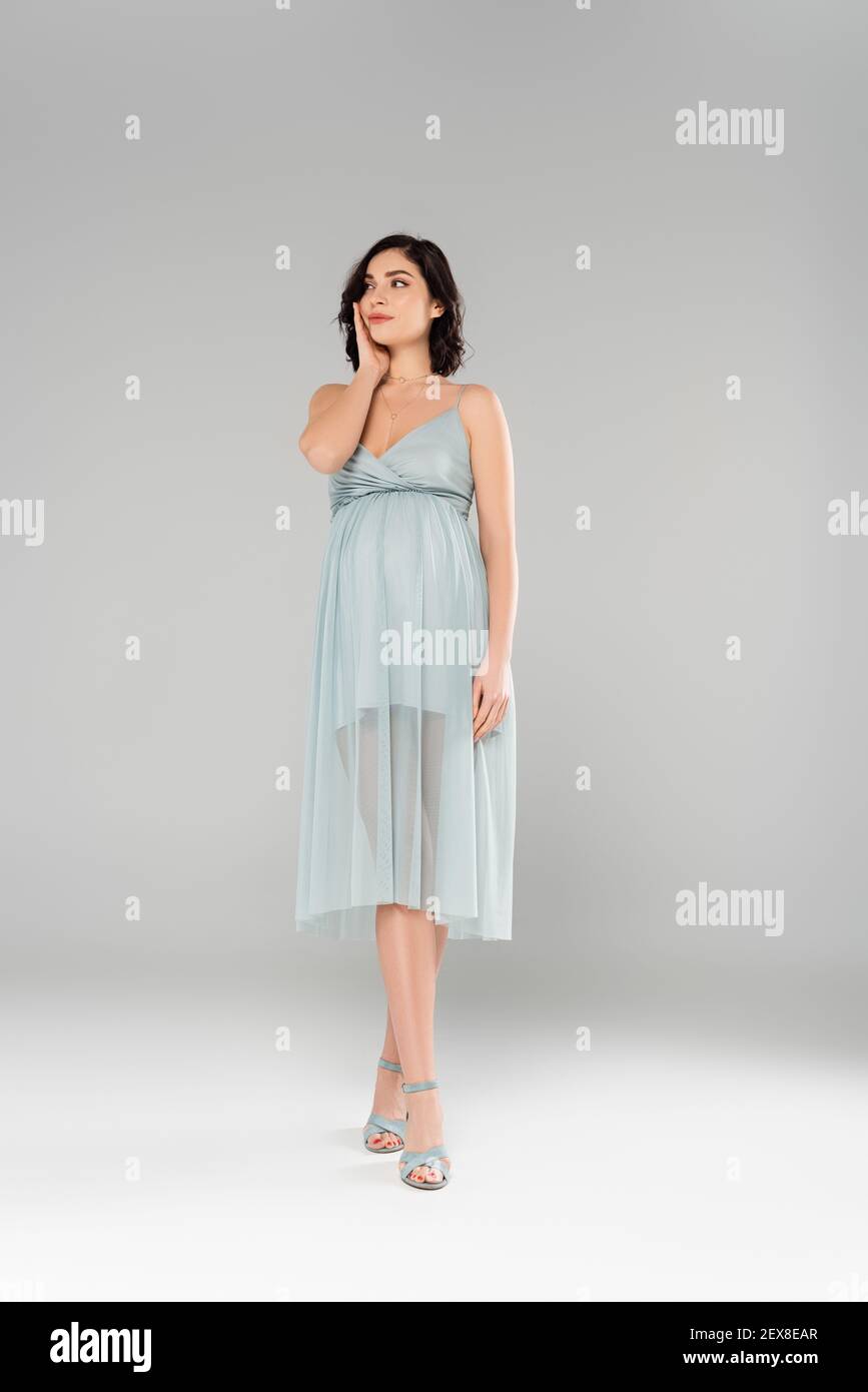 Pregnant couple standing on hi-res stock photography and images - Alamy