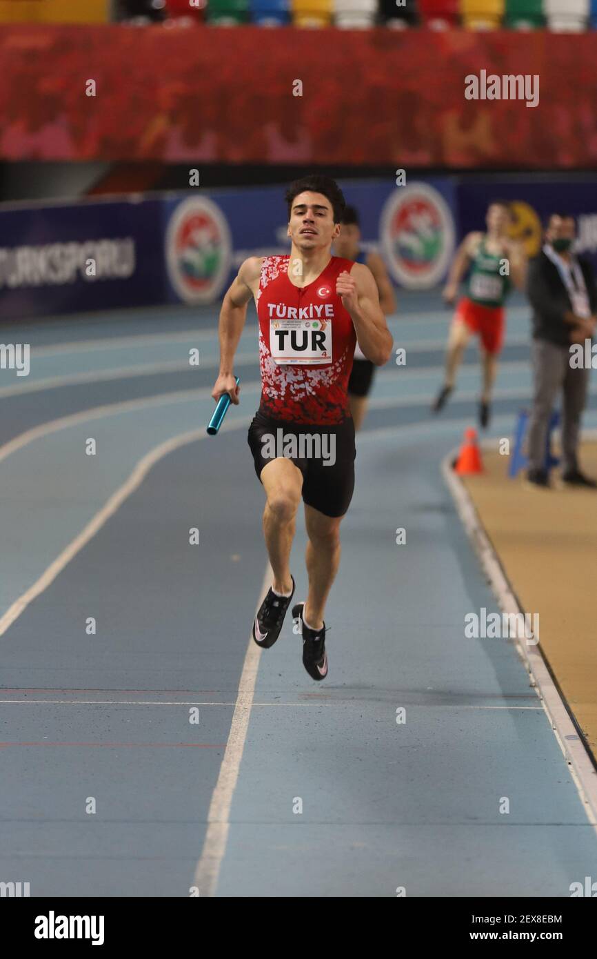 ISTANBUL, TURKEY - FEBRUARY 20, 2021: Undefined athlete running 4x400 ...