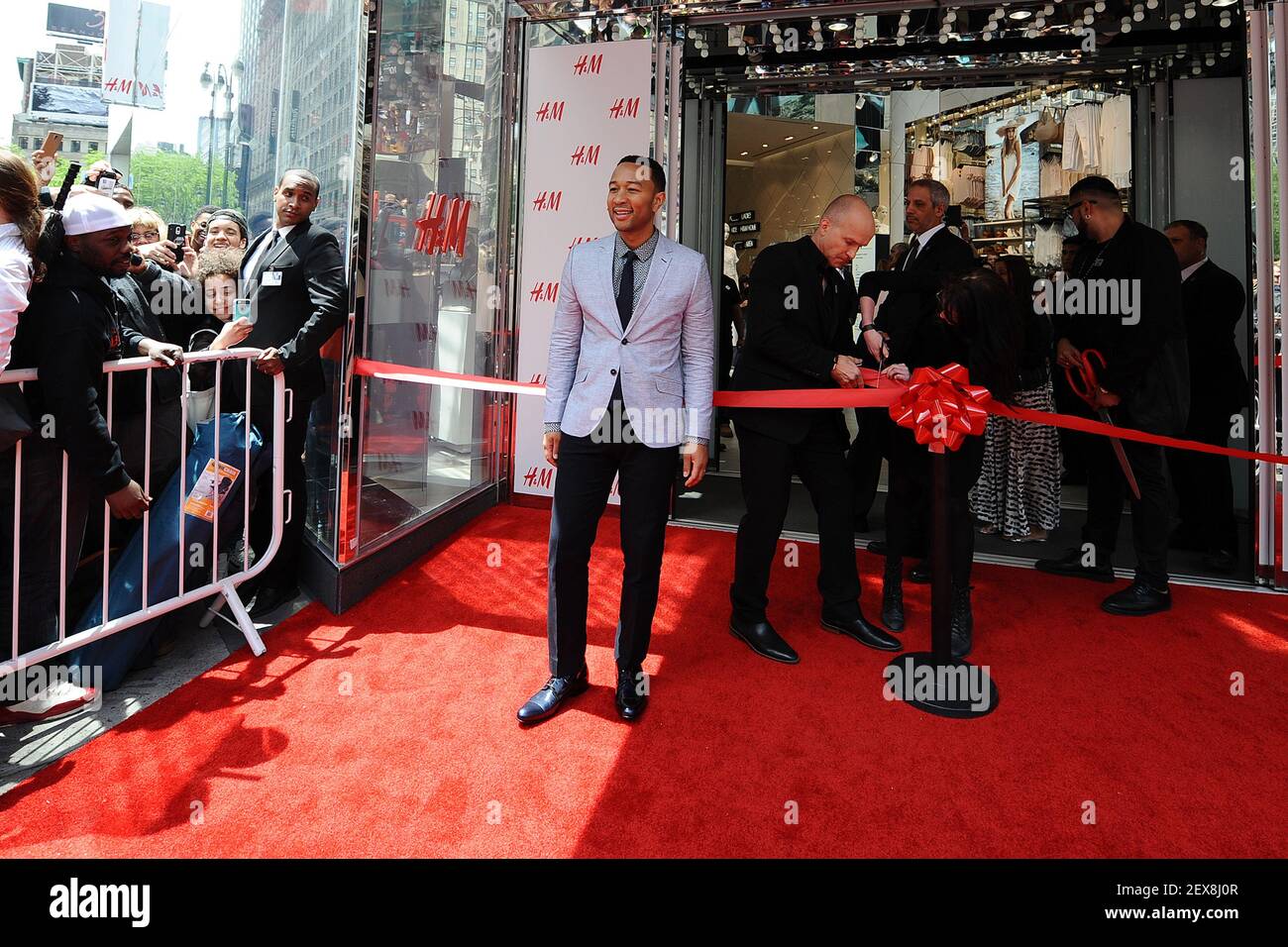 Musician John Legend attends the ribbon cutting ceremony for the ...