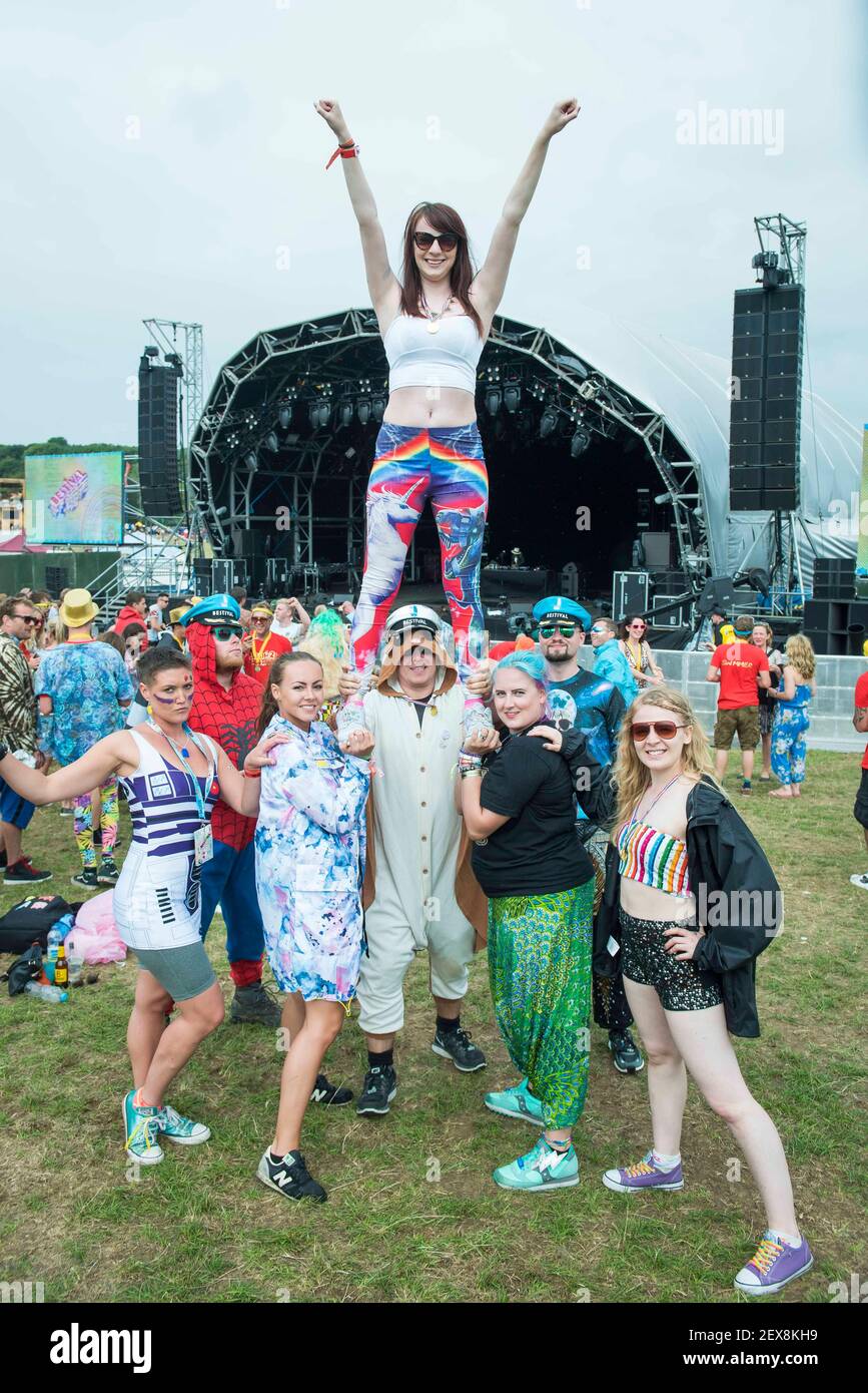Festival goer is lifted above her friends in the main stage arena on ...