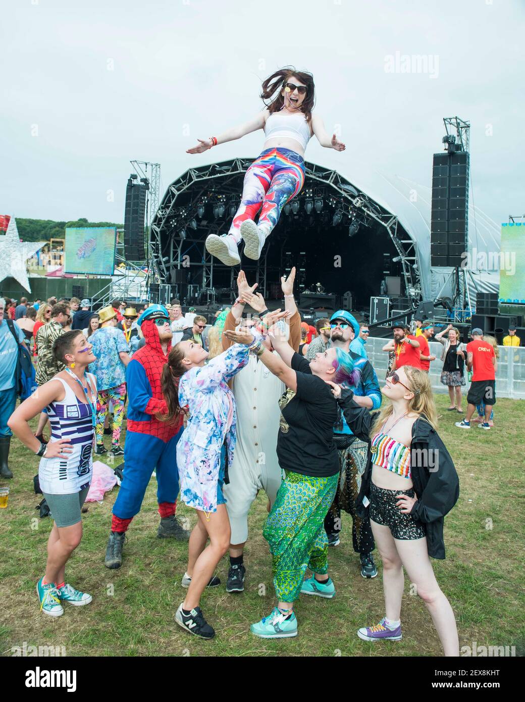 Festival goer is lifted above her friends in the main stage arena on ...