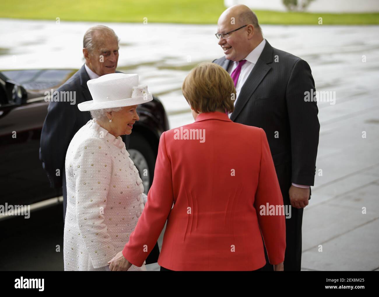Queen Elizabeth II and Prince Philip is welcomed by German Chancellor ...