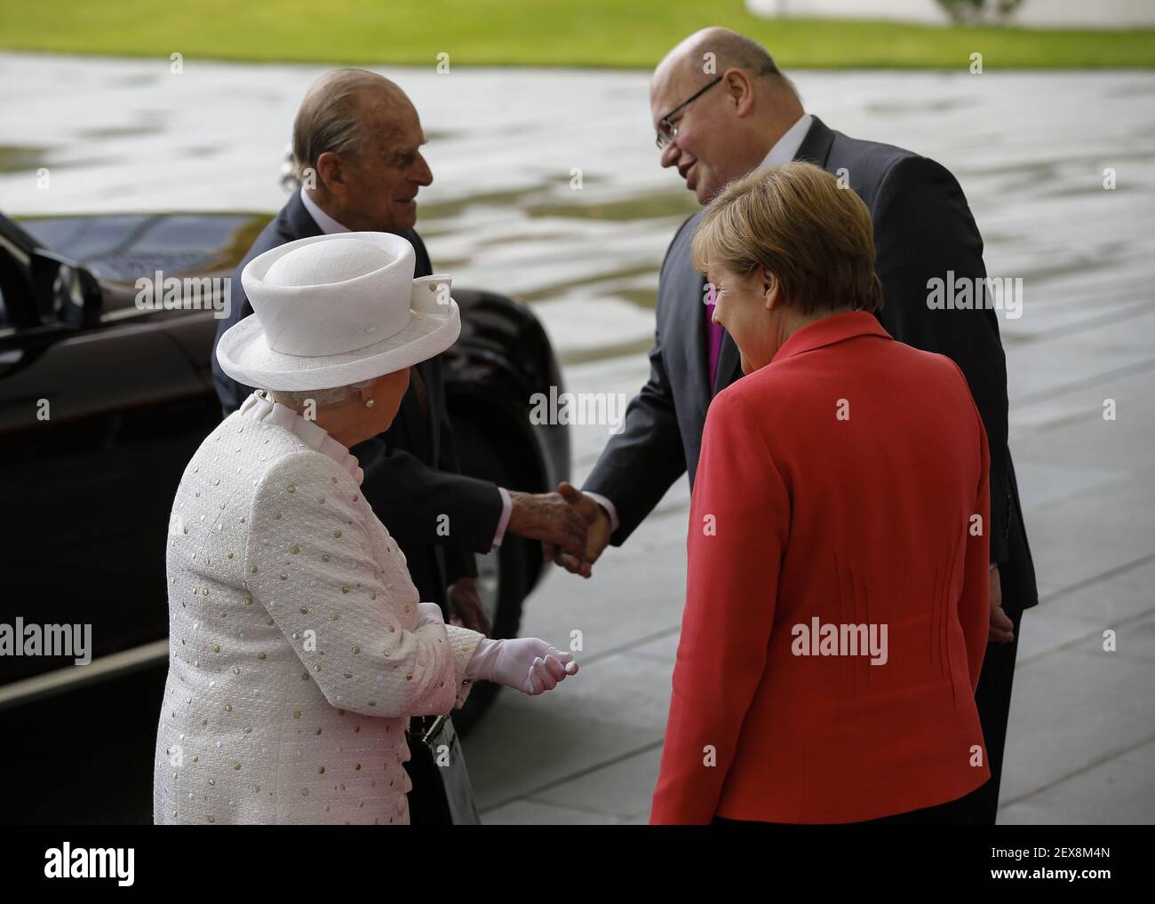 Queen Elizabeth II and Prince Philip is welcomed by German Chancellor ...