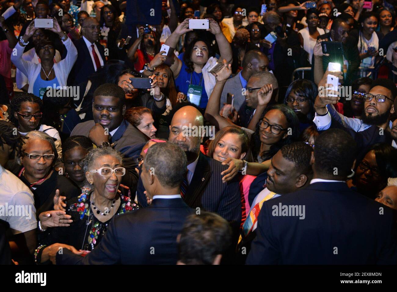 Alfreda Mills, left, 80, gets close to President Barack Obama after he ...