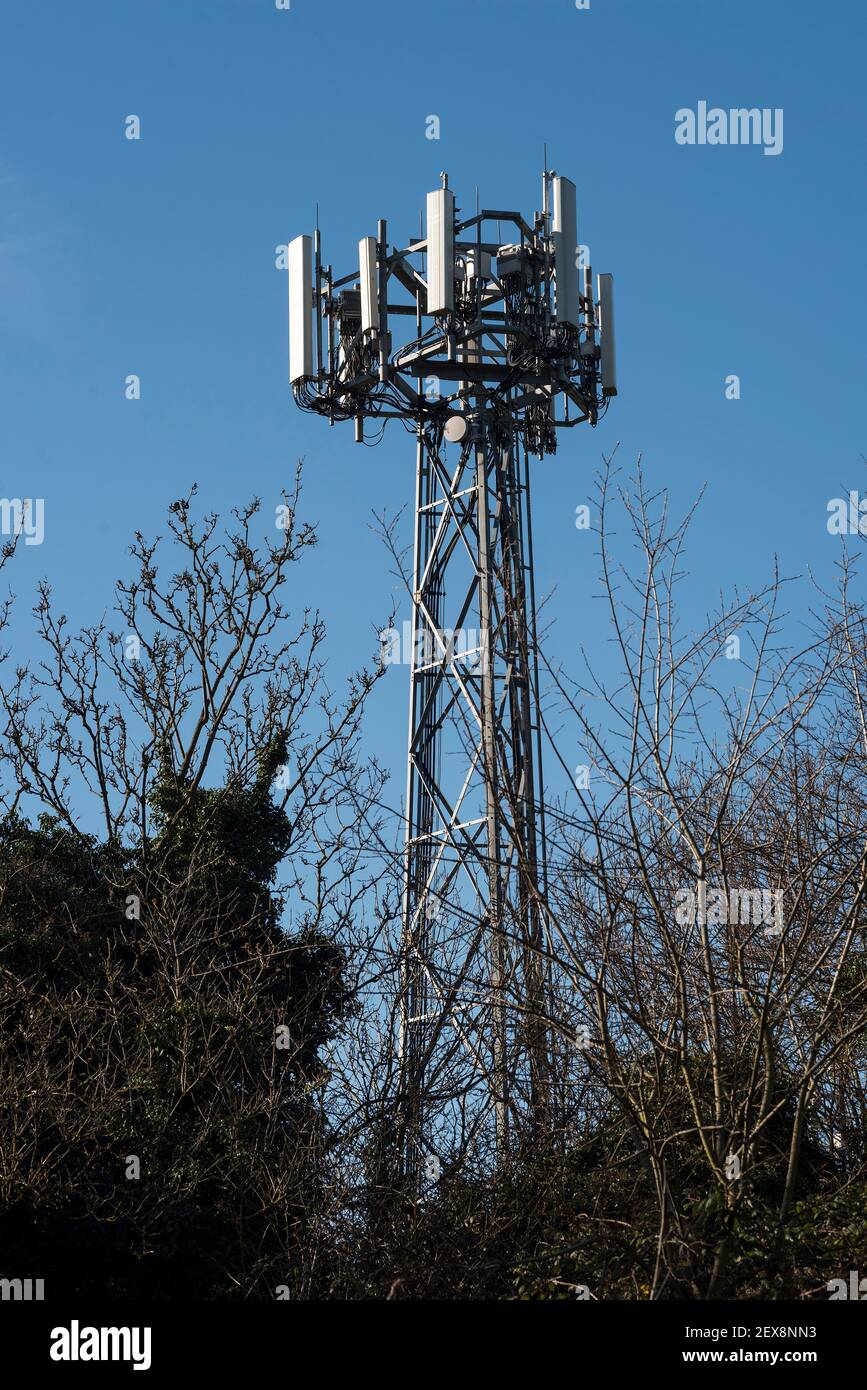 A mobile phone tower / mast with several antenna Stock Photo - Alamy
